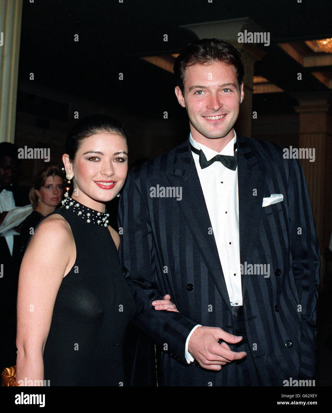 Actress Catherine Zeta Jones accompanied by John Leslie arrives at ...