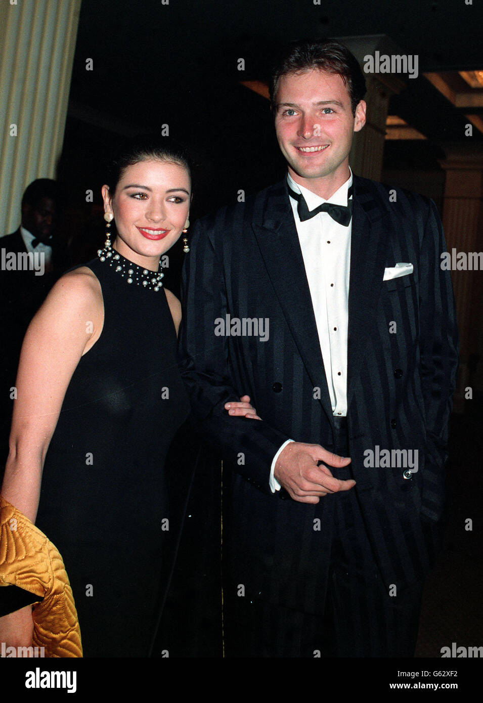 Actress Catherine Zeta Jones accompanied by John Leslie arrives at ...