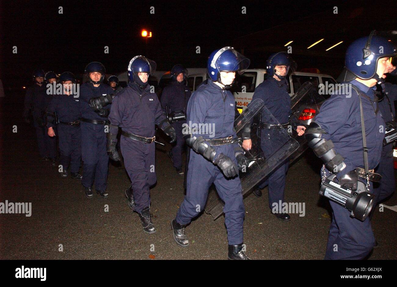 Riot shield police helmet torch hi-res stock photography and images - Alamy