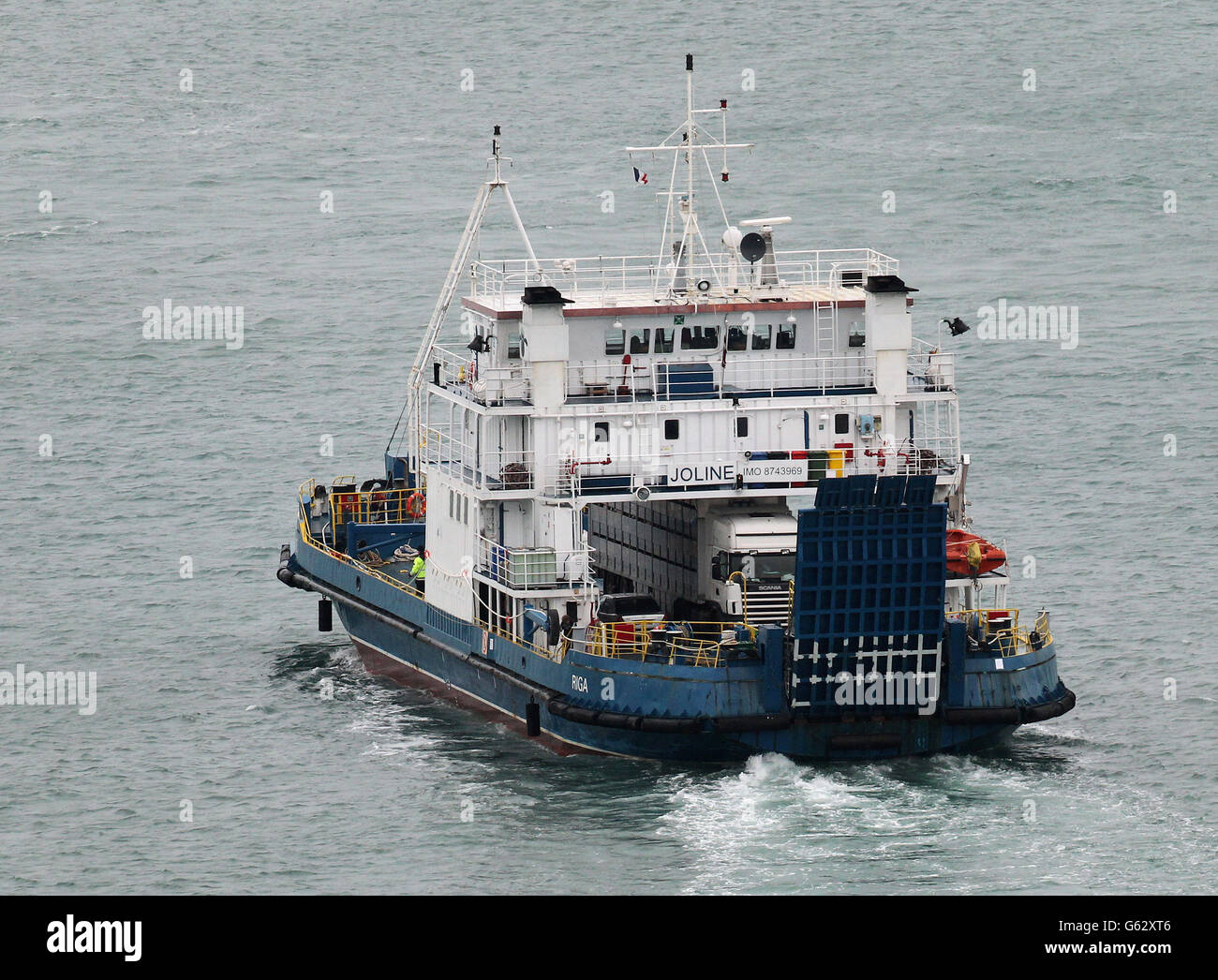 Export ship the MV Joline carries a livestock transporter as it leaves ...