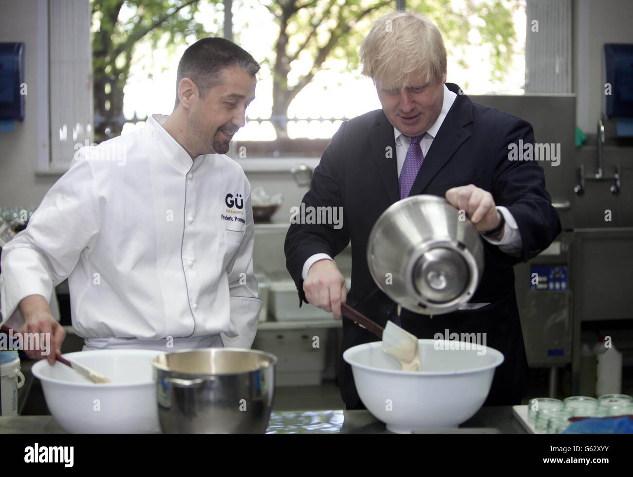 Mayor of London Boris Johnson makes a Gu chocolate souffle with head ...