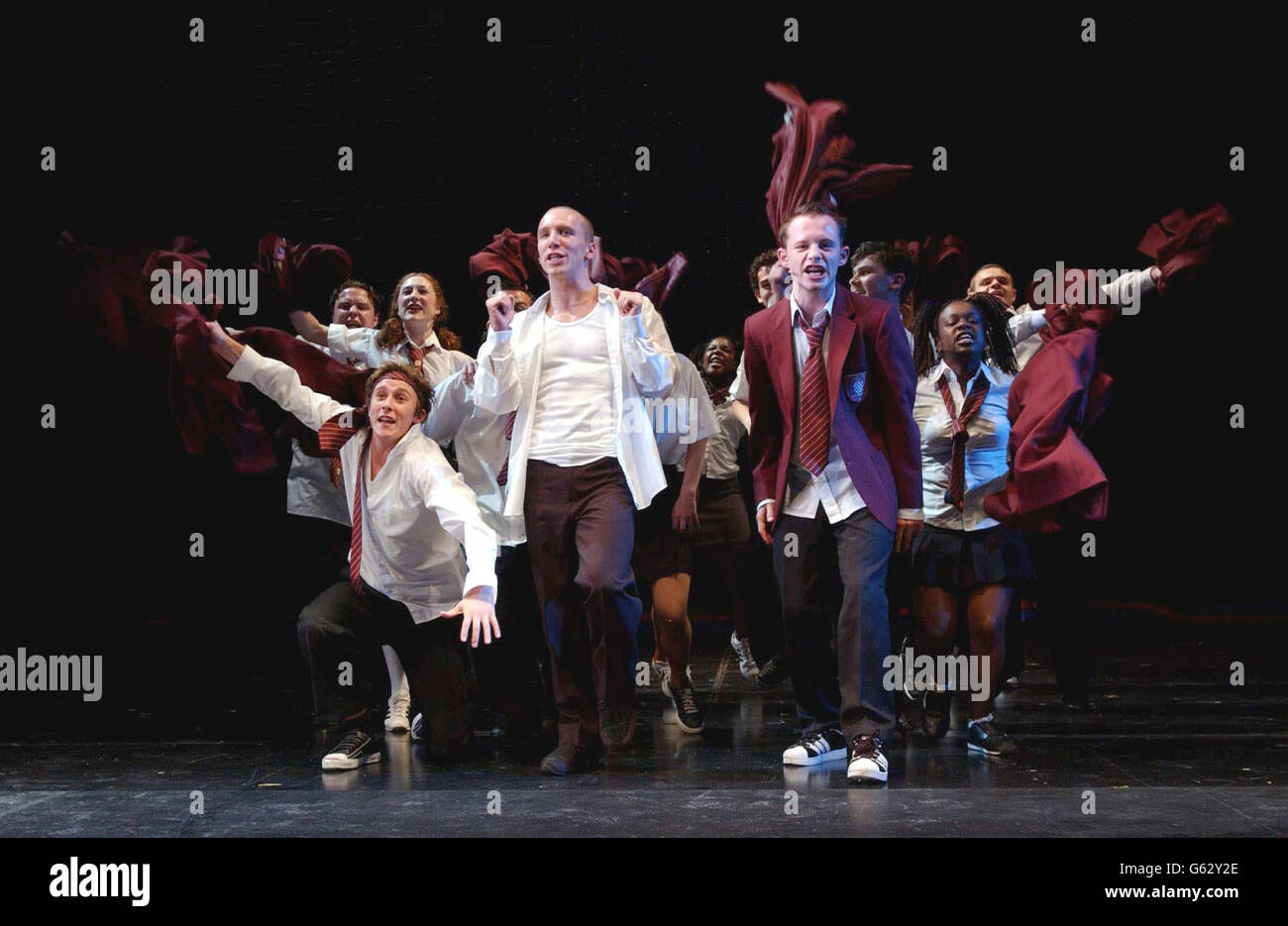 Cast members perform on stage during a photocall for the musical 'Our ...