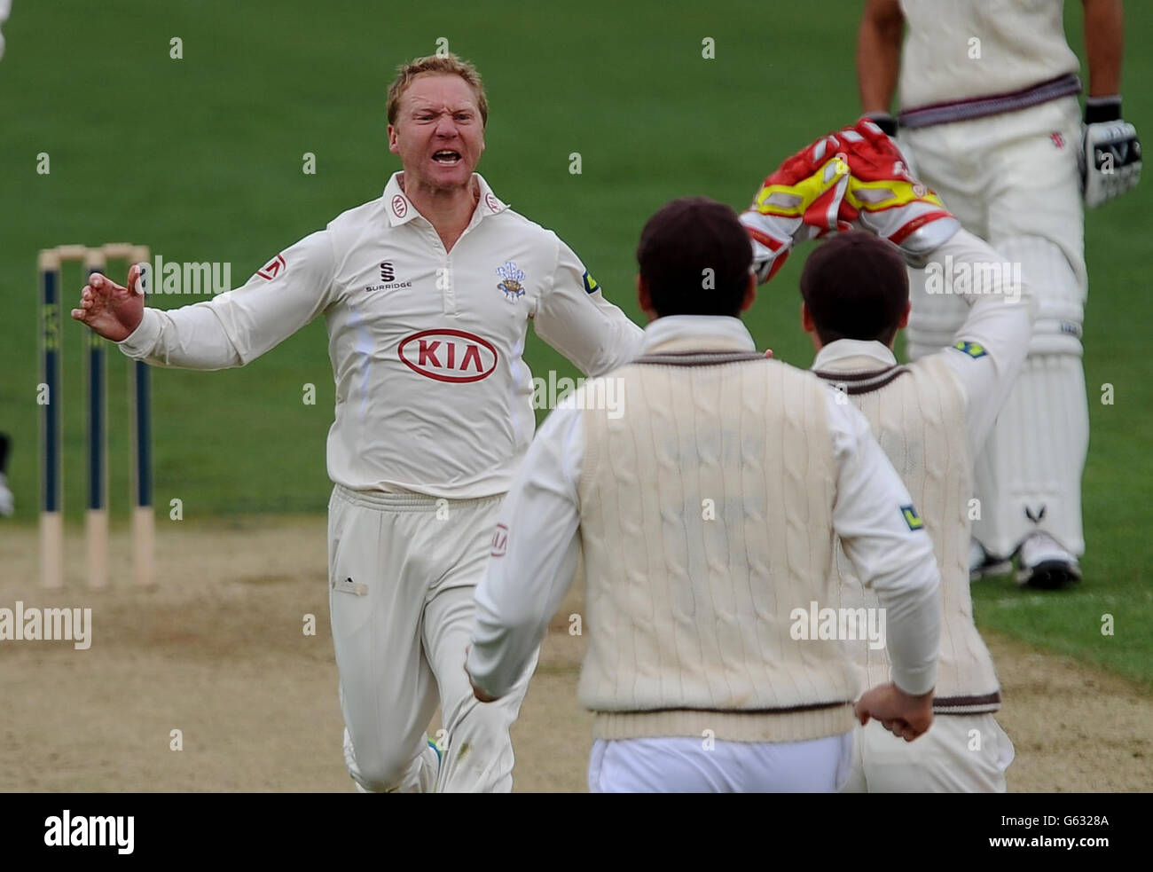 Surrey's Gareth Batty (left facing) celebrates with Graeme Smith ...