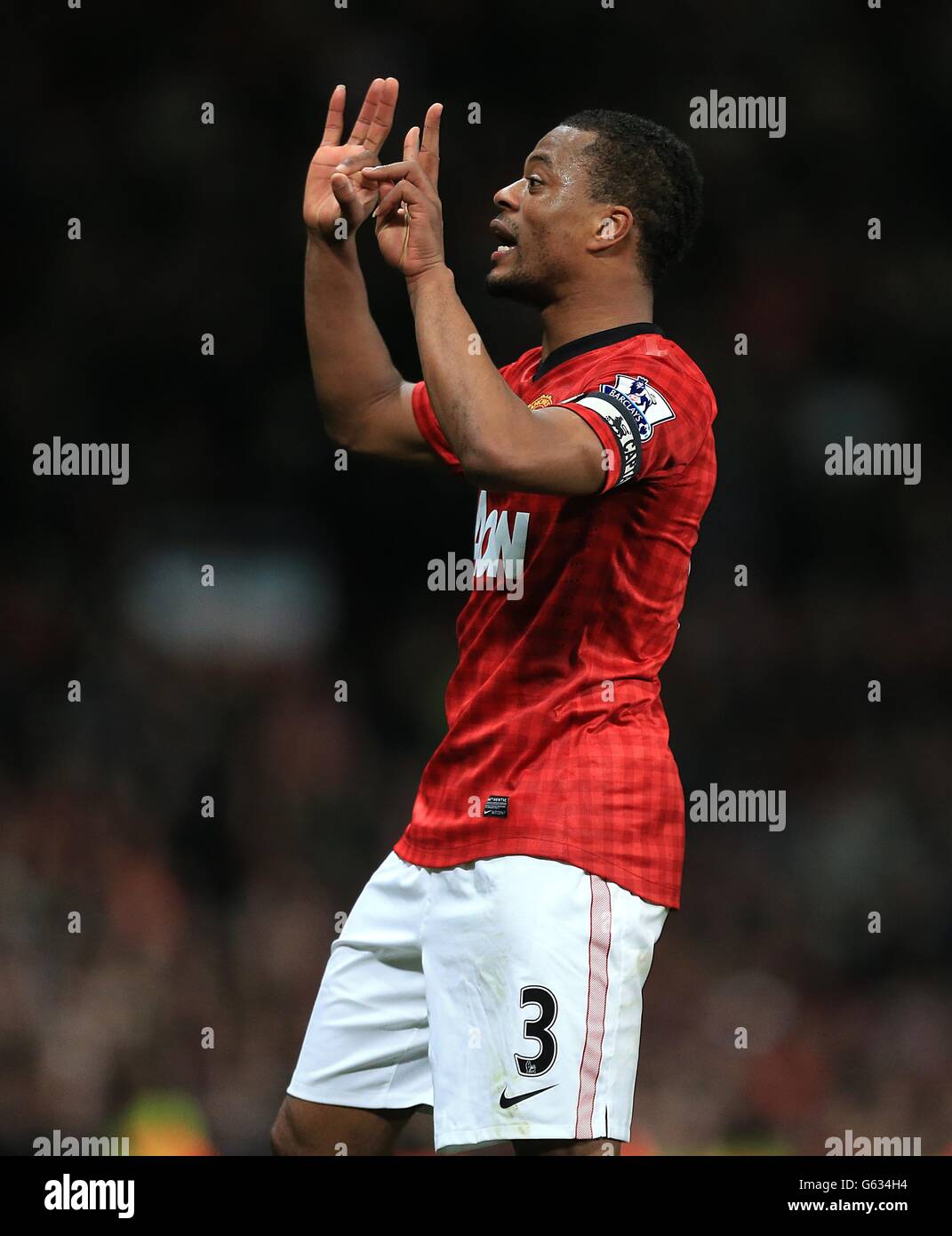 Manchester United Patrice Evra celebrates the clubs 20th league title ...