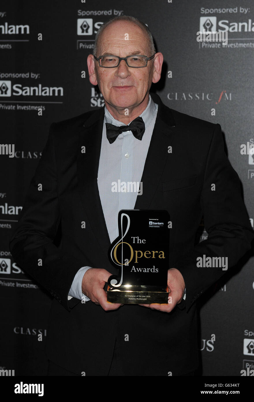 Antony MacDonald poses after winning the Set Designer Award during the ...