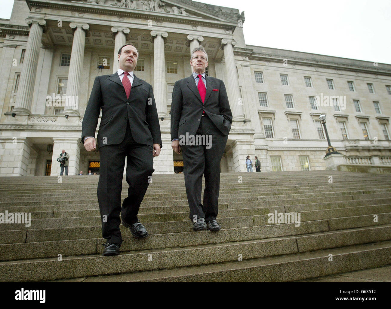 Democratic Unionist Ministers Peter Robinson (right) and Nigel Dodds ...