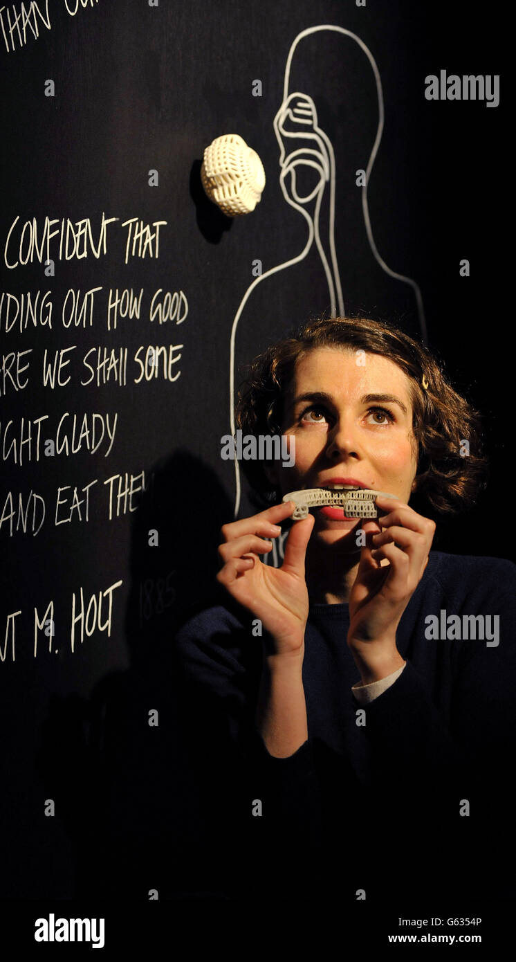 Designer Susana Soares holds an insect cookie made from a flour of ...