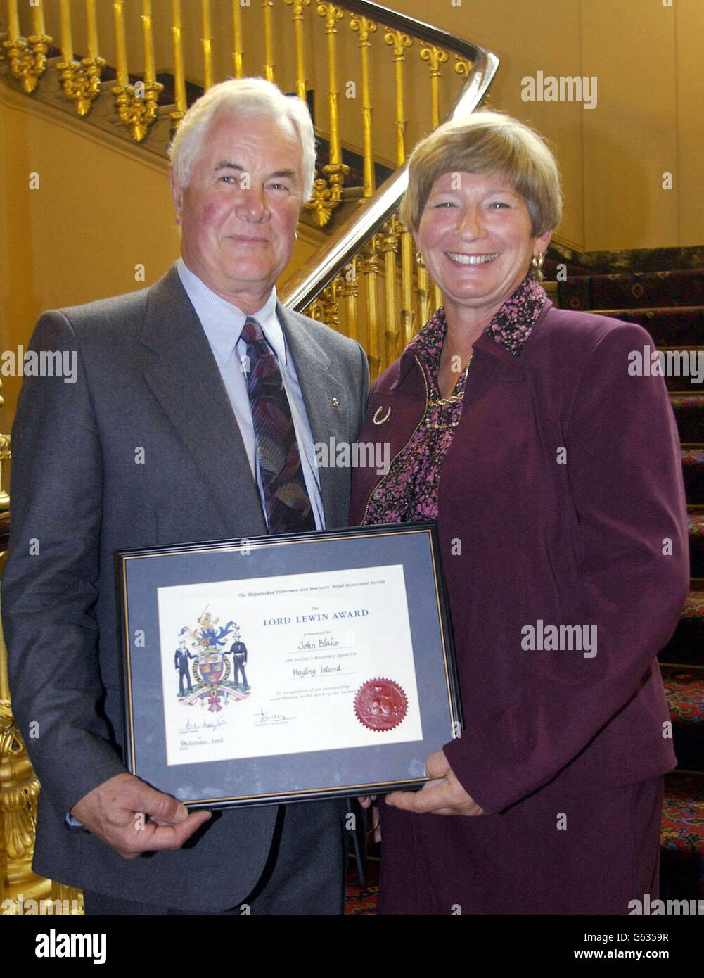 John Blake (left) with his wife, Marilyn, receive the Lord Lewin Award ...