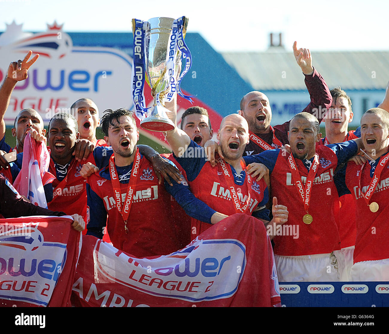 Gillingham captain adam barrett lifts the football league two trophy hi ...