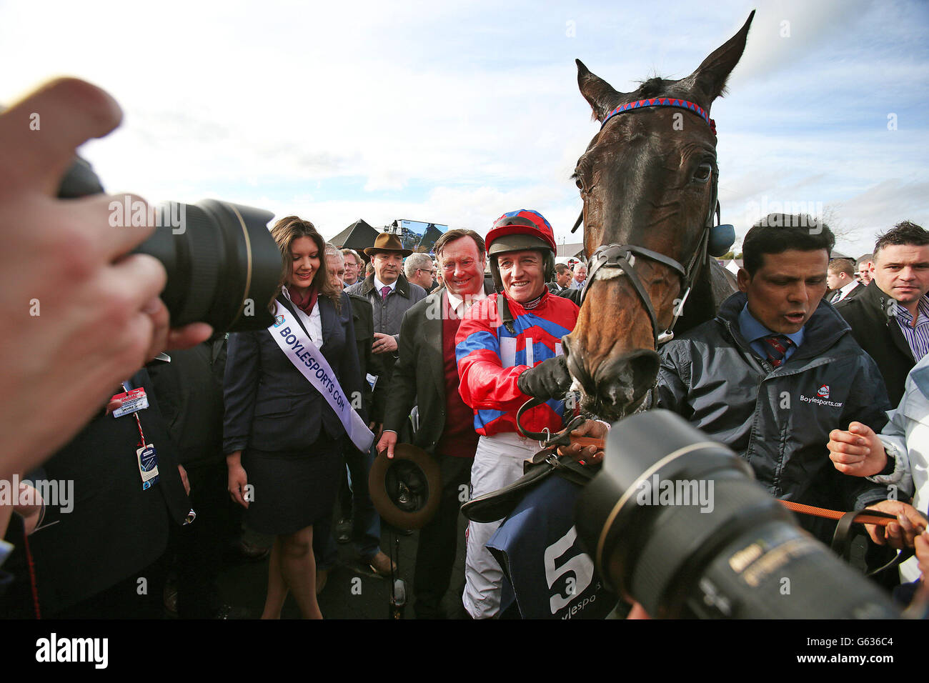 Sprinter Sacre and jockey Barry Geraghty celebrates victory over Sizing ...