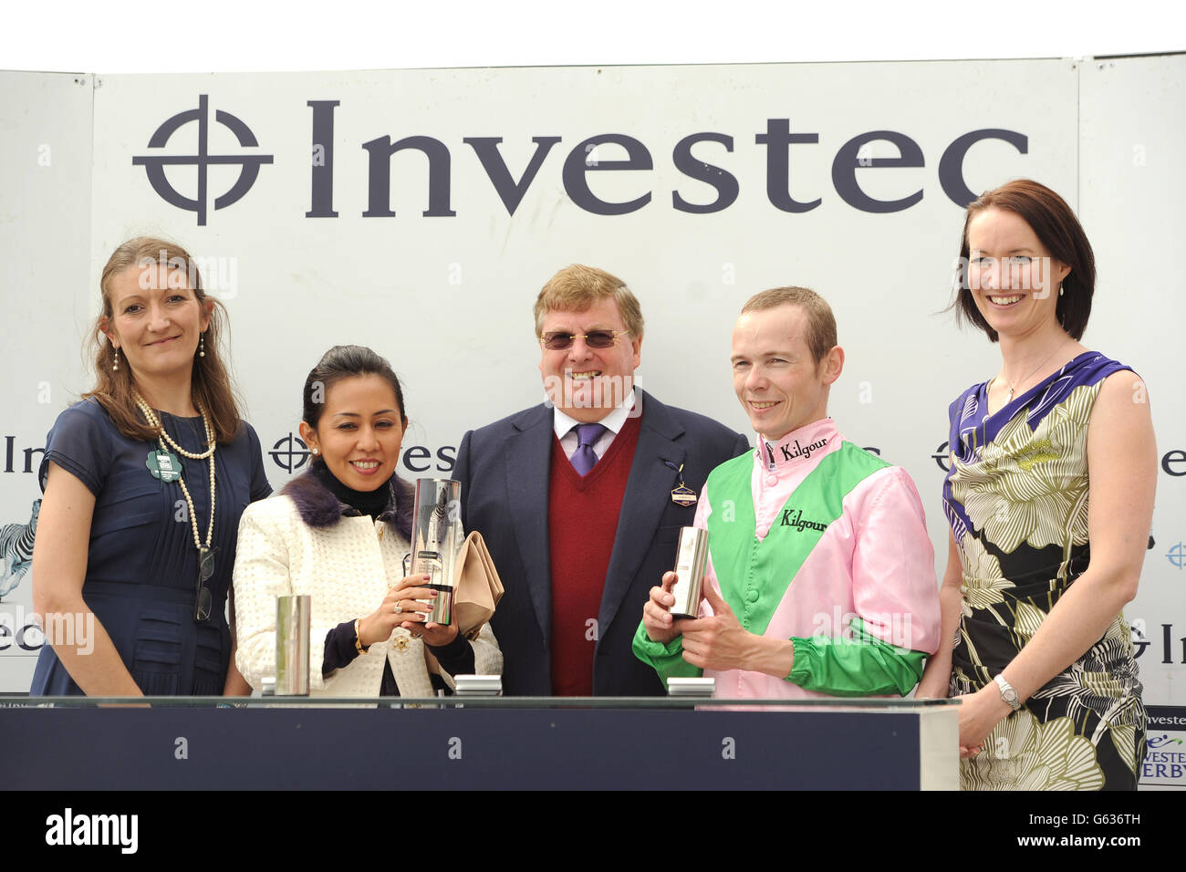 Owner Fitri Hay (left) and jockey Jamie Spencer (right) pick up their ...