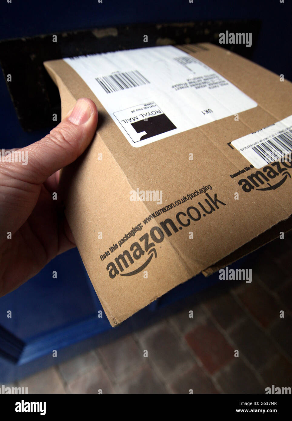 Amazon logo on packaging hi-res stock photography and images - Alamy