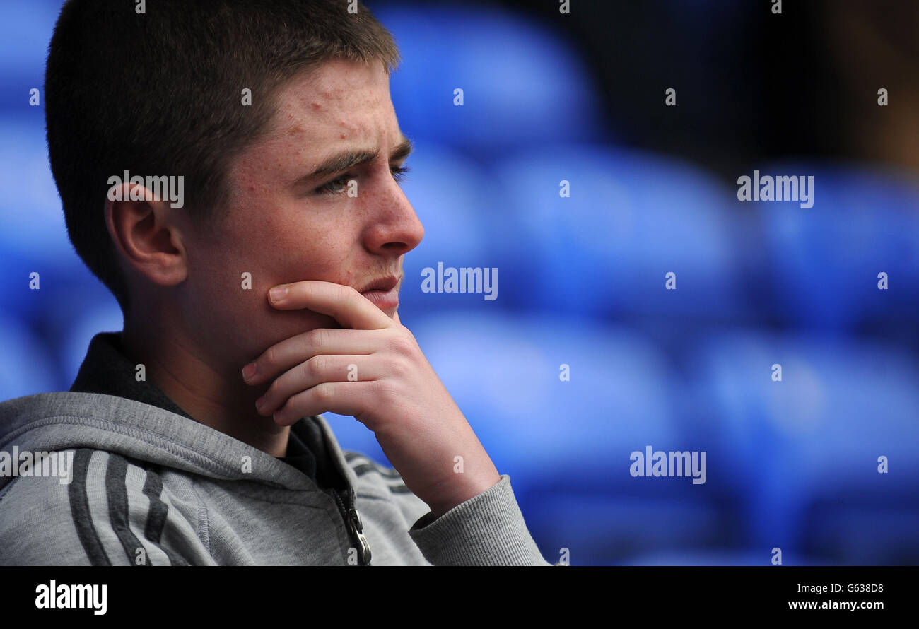A Queens Park Rangers' fan looks on dejected following his sides ...