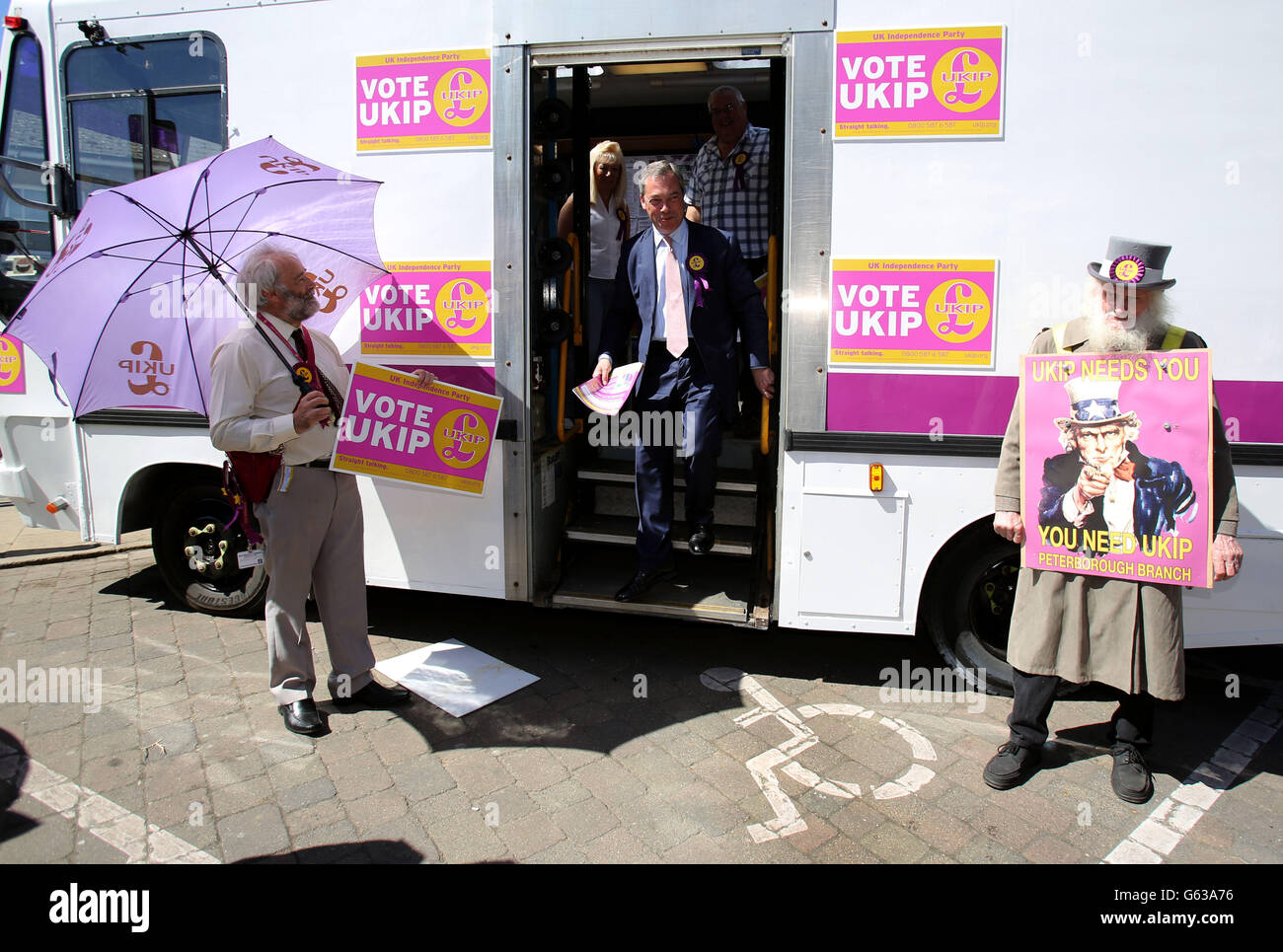 Leader of UKIP Nigel Farage, steps out of the UKIP campaign truck that ...