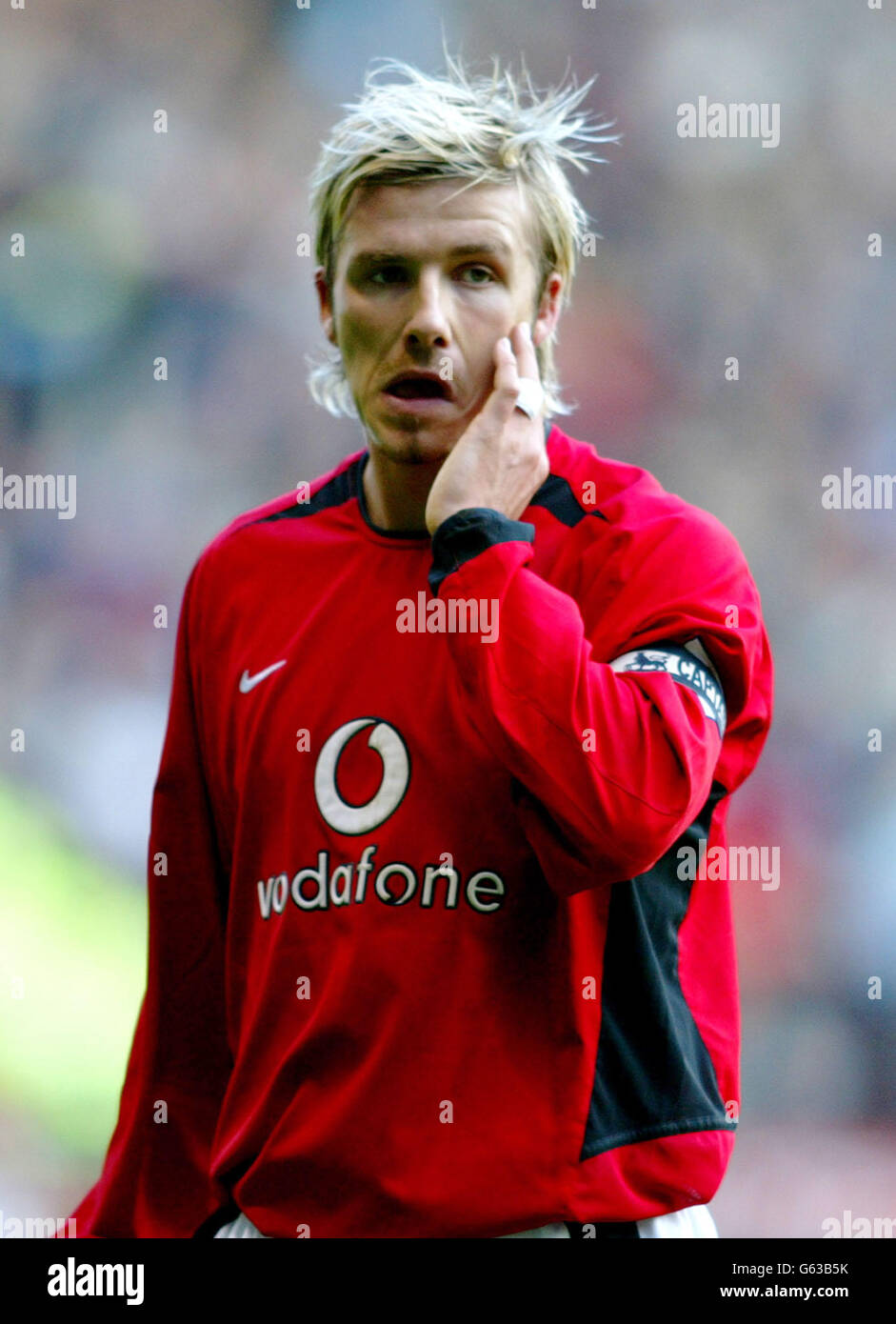 Sport football head shoulders hand on face david beckham hi-res stock ...