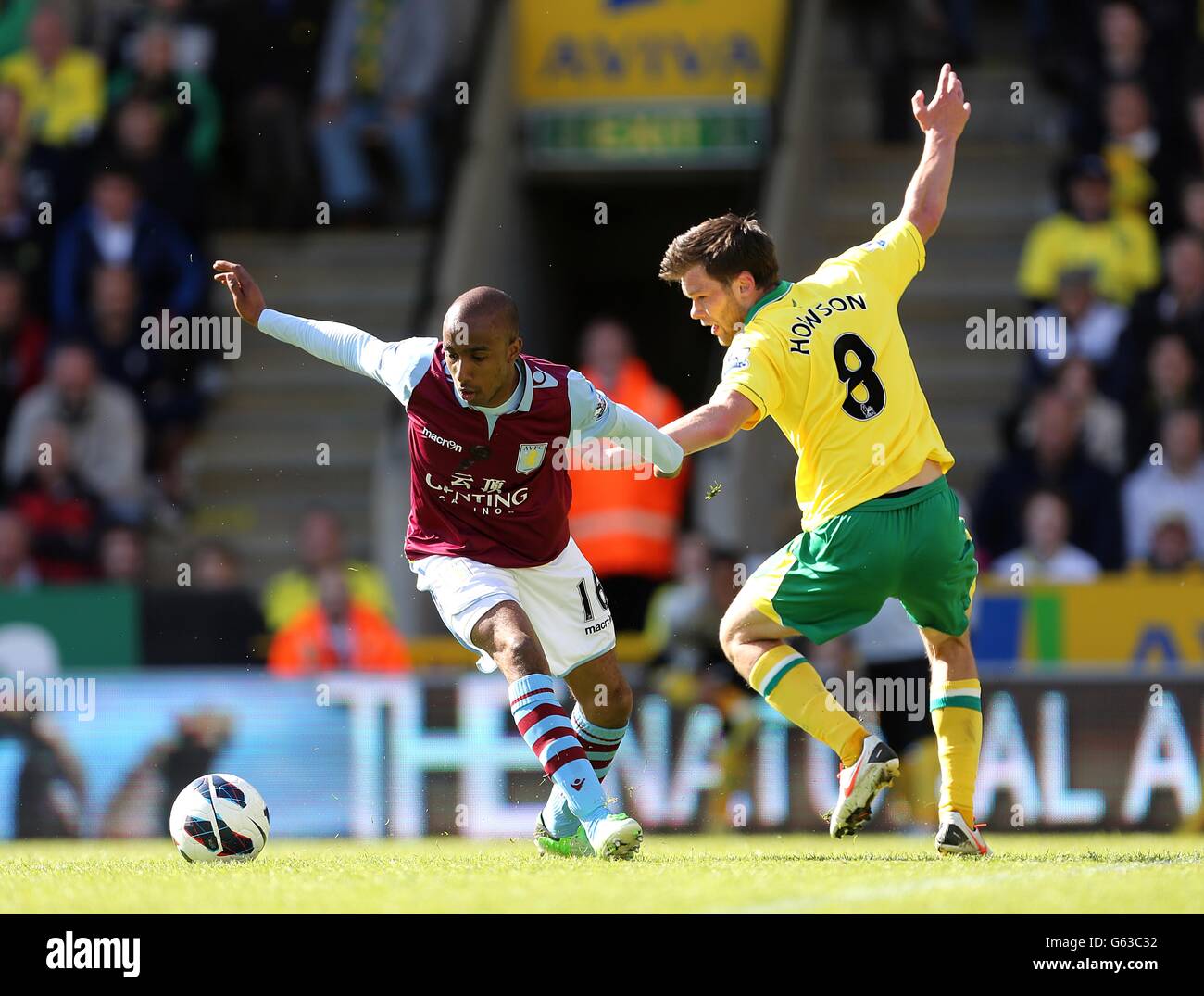 Aston Villa's Fabian Delph and Norwich City's Jonathan Howson (right ...