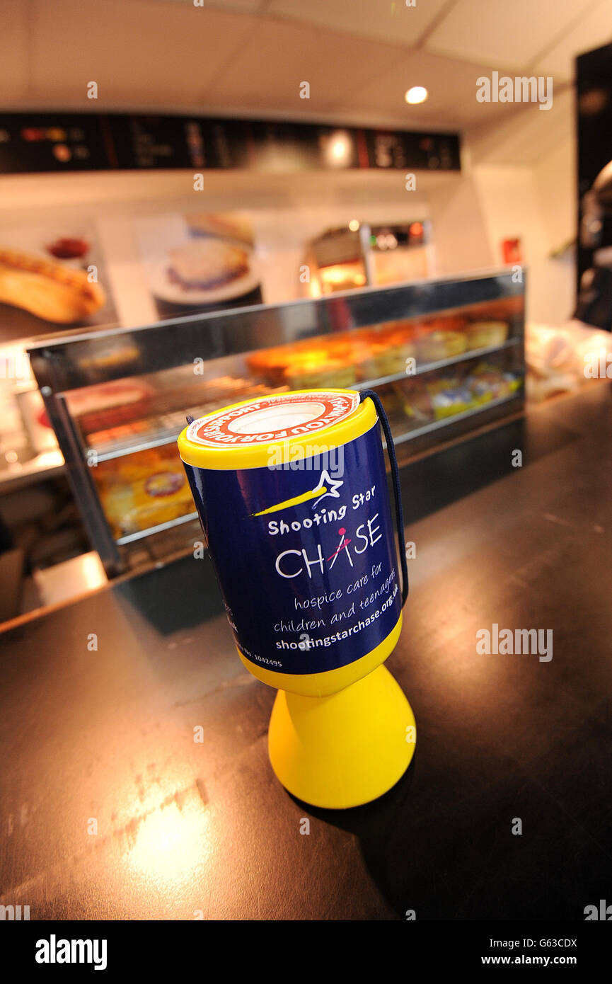 A shooting Star Chase charity collection pot at Craven Cottage Stock ...