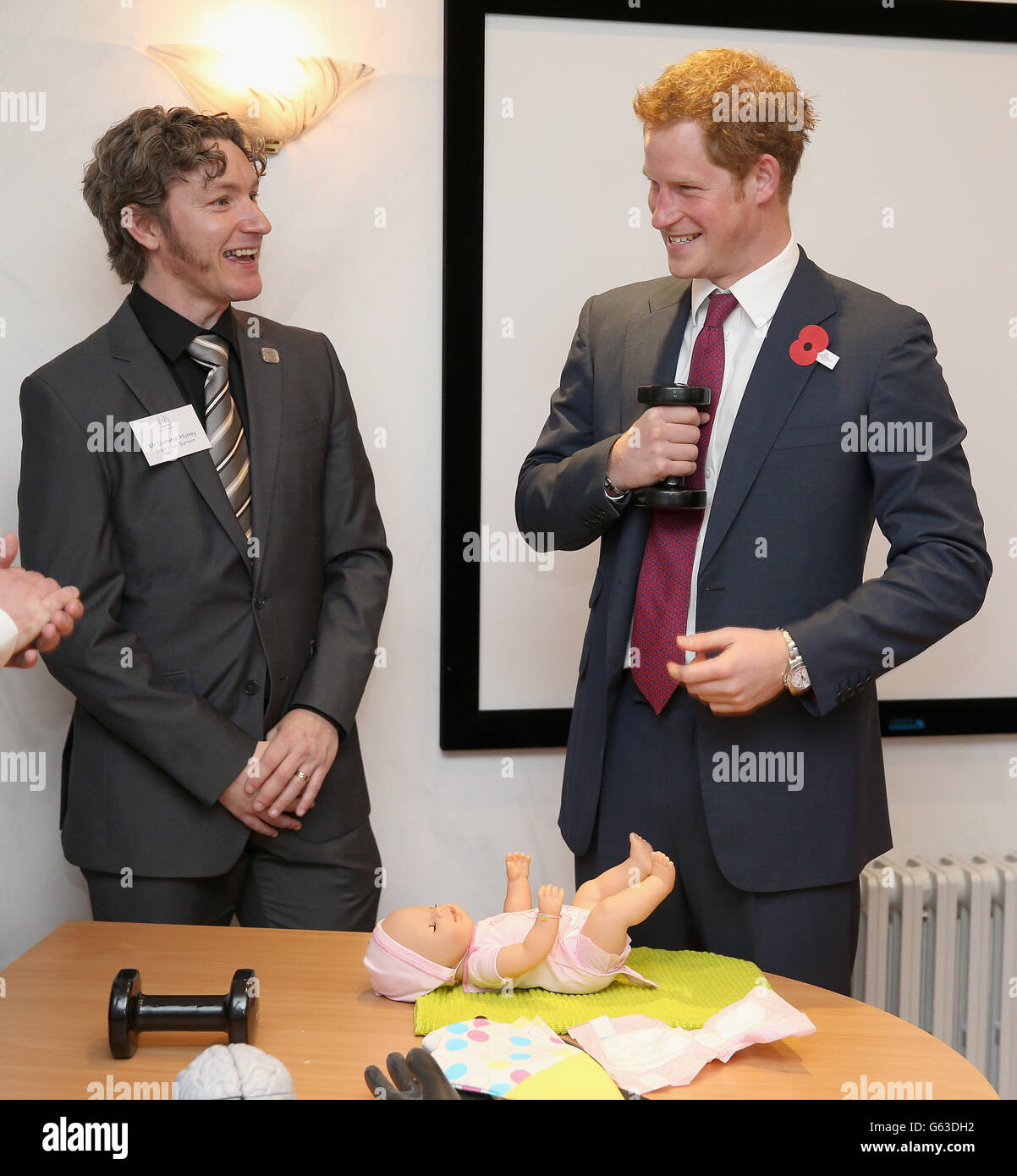 Prince Harry with brain injury survivor Dominic Hurley as he opens the ...