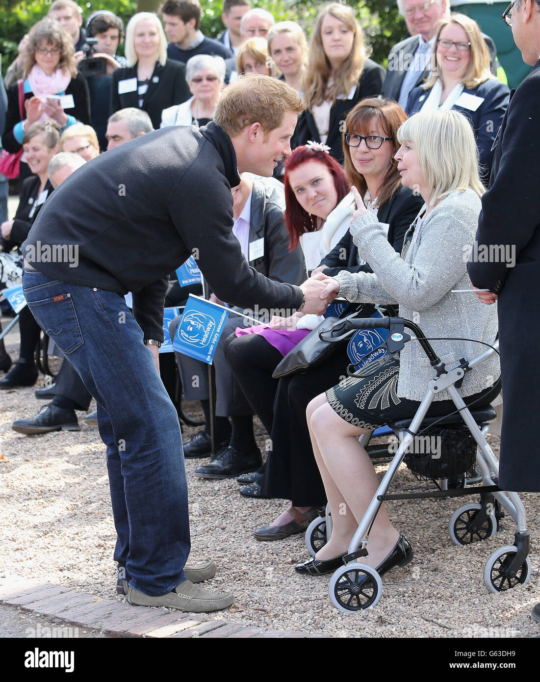 Prince Harry talks to brain injury survivor Mary Dery as he opens the ...