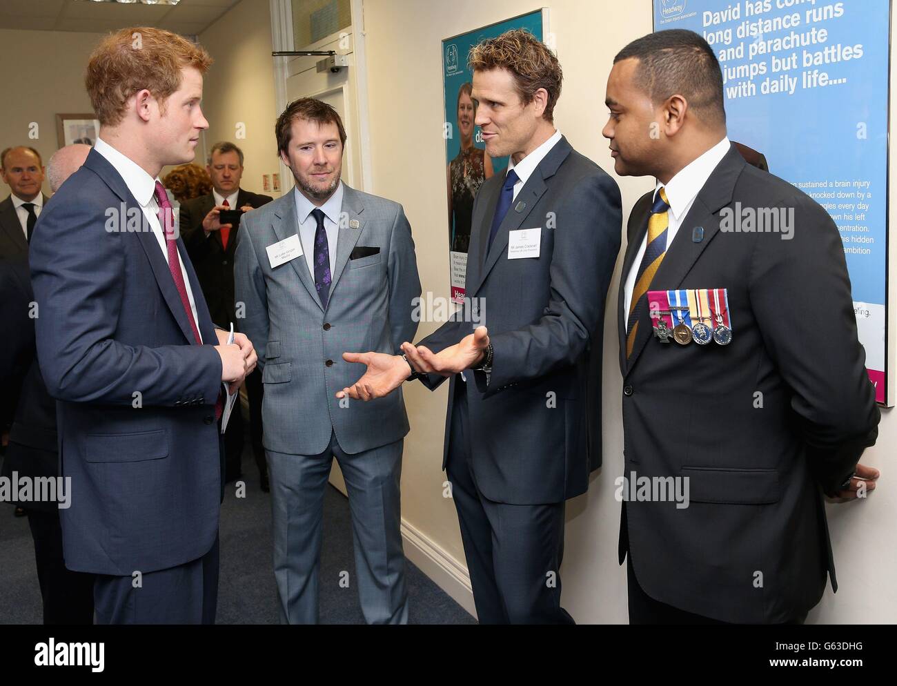 Prince Harry talks to James Cracknell and Johnson Beharry as he opens ...