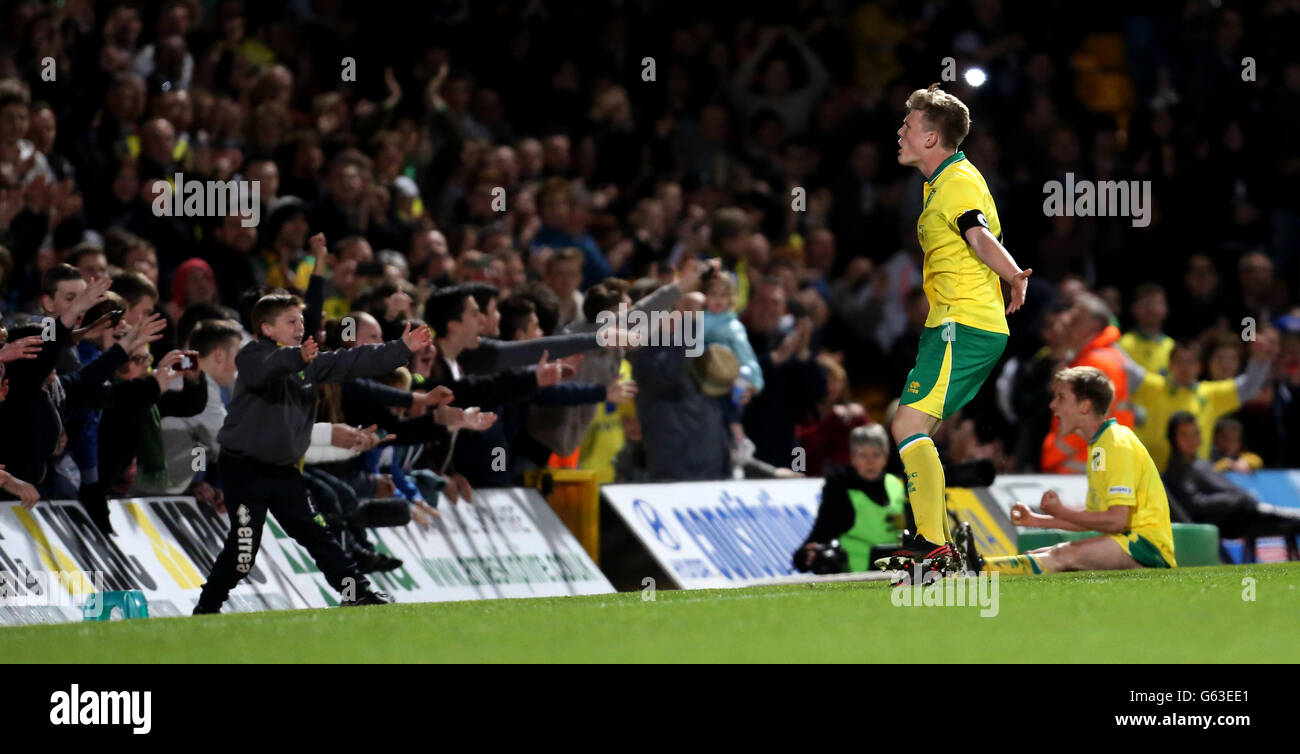 Norwich City's Cameron McGeehan celebrates scoring his penalty past ...