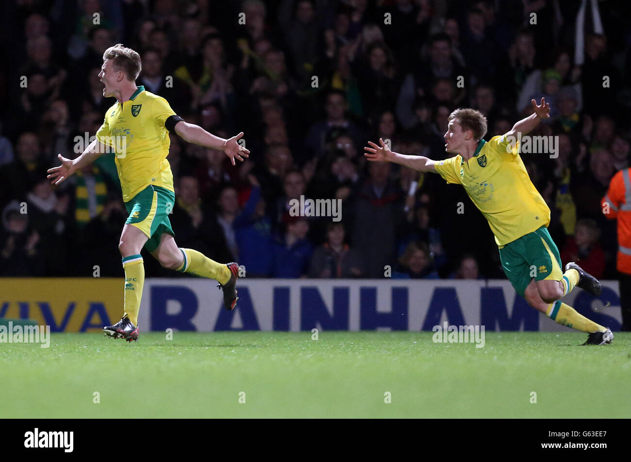 Norwich City's Cameron McGeehan celebrates scoring his penalty past ...