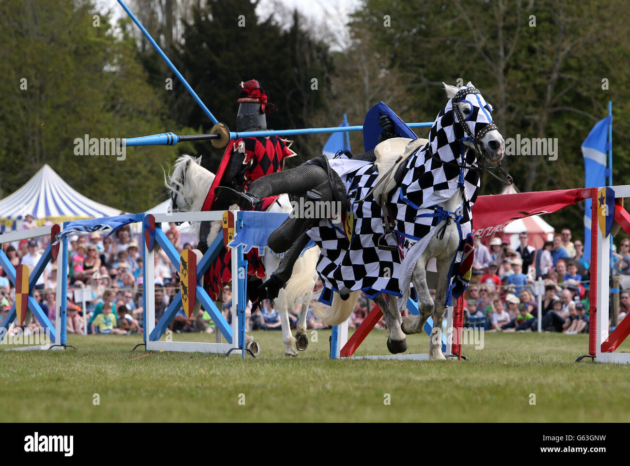 Sir Sam is knocked off his horse by Sir Jasper (left) as the Knights of ...