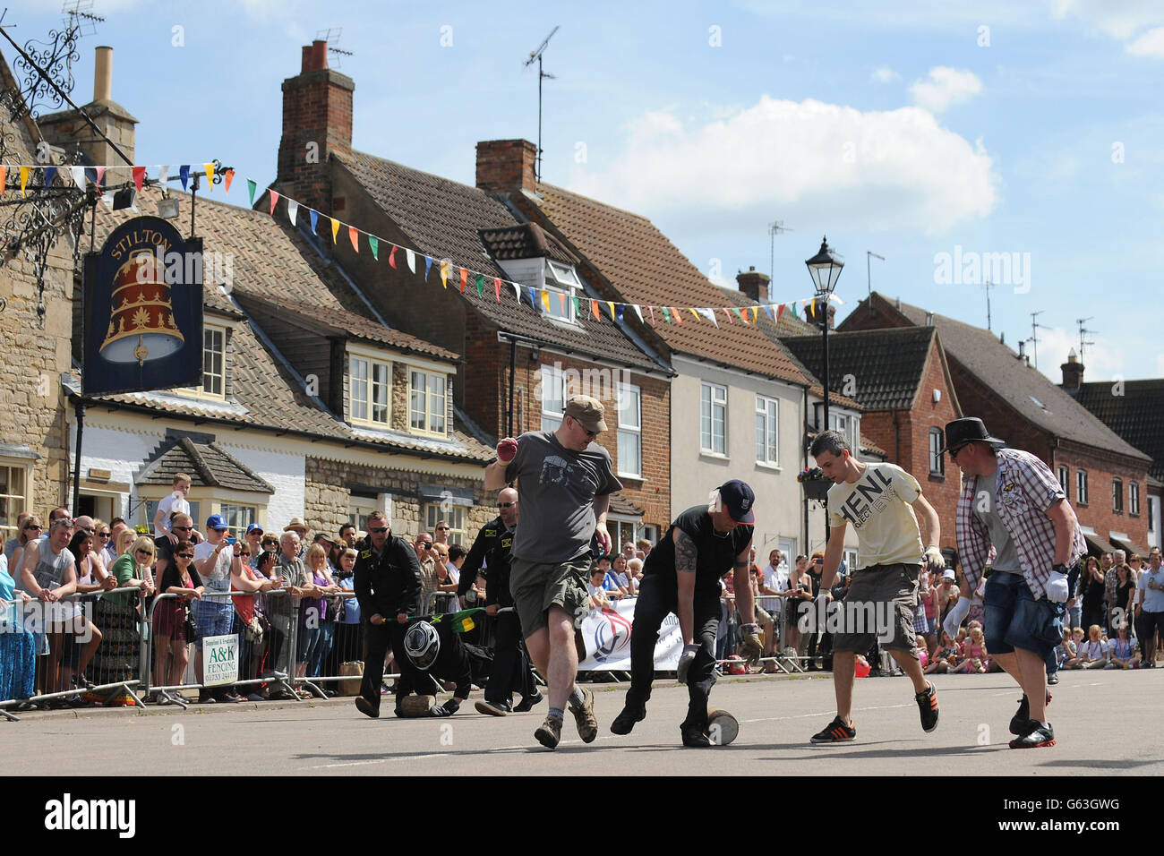 Locals take part in the Stilton Cheese Rolling competition in Stilton ...