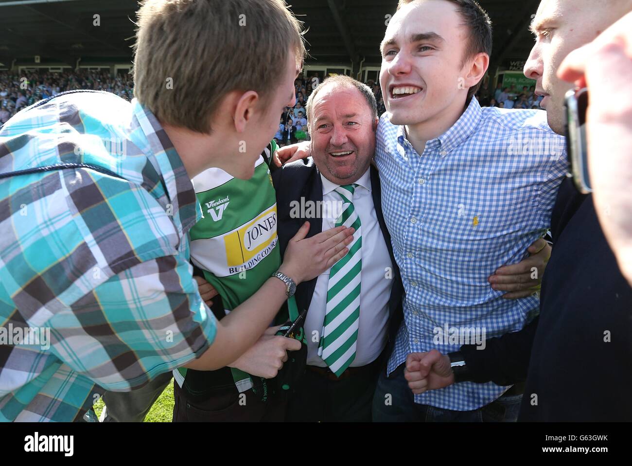 Football fans on pitch final whistle hi-res stock photography and ...