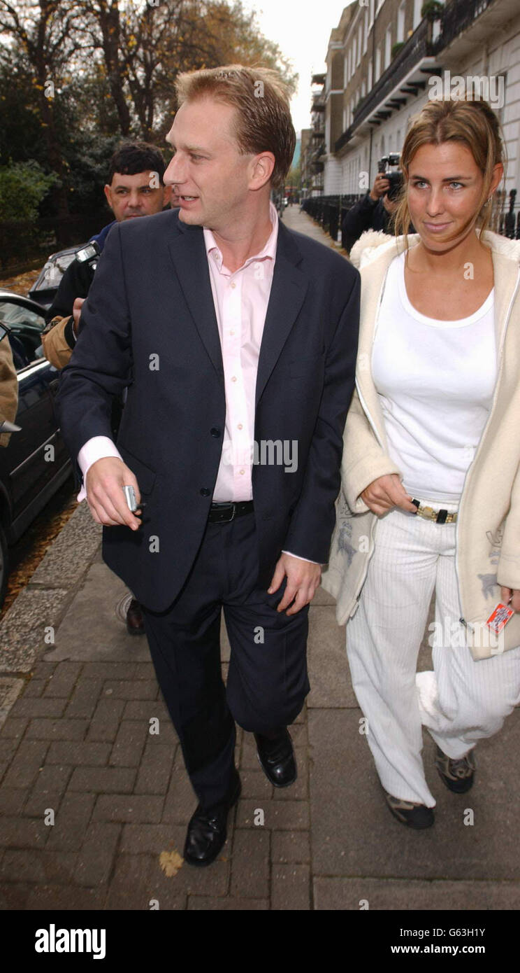 Lawyer Martin Cruddace leaves TV presenter Angus Deayton's house with ...