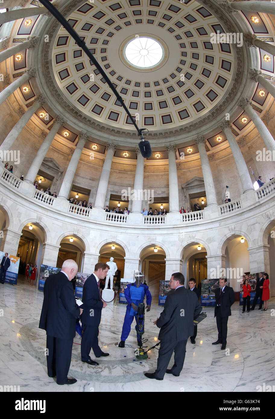 Senator John McCain and Prince Harry tour an anti-landmine photography ...