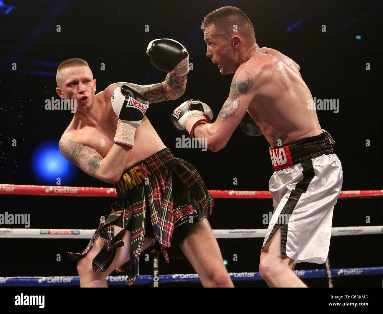Action against ricky burns during hi-res stock photography and images ...