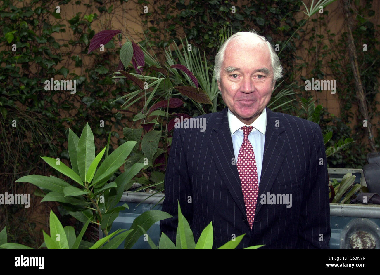 Environment economy fund raising group smiling plants hi-res stock ...