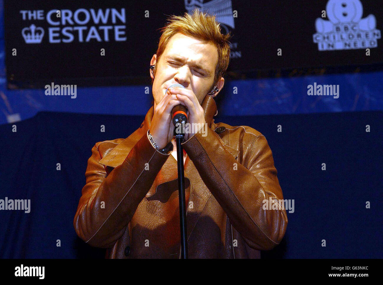 Celebrity Singing Microphone Brown Leather Jacket High Resolution Stock ...