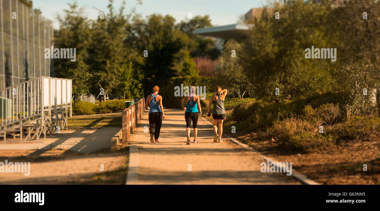 Women in a park on a walk Stock Photo - Alamy