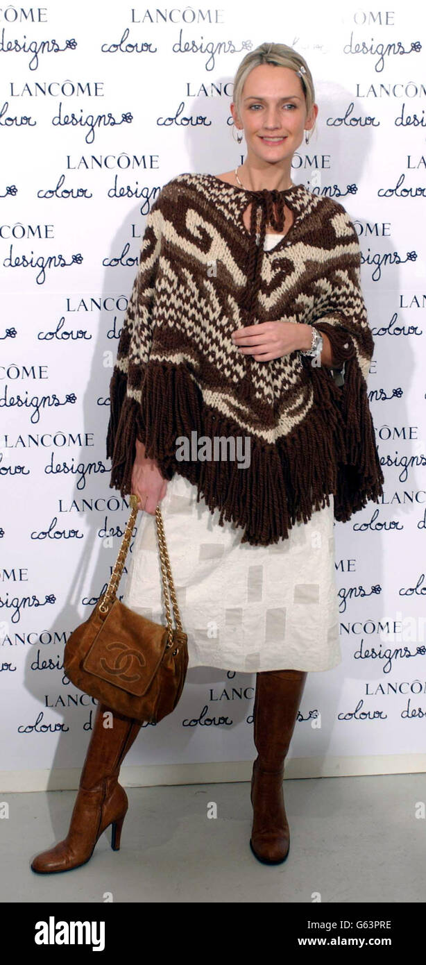 Model Saffron Aldridge poses for photographers as she arrives for the ...