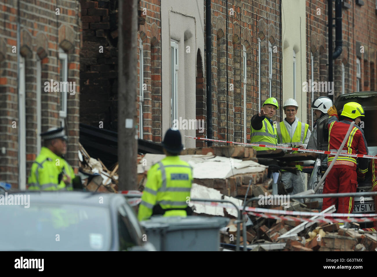 Emergency services outside the remains of a house in Wright Street ...