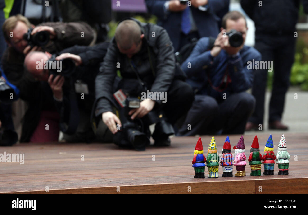 Gnomes designed by various celebrities including Elton John's (centre ...