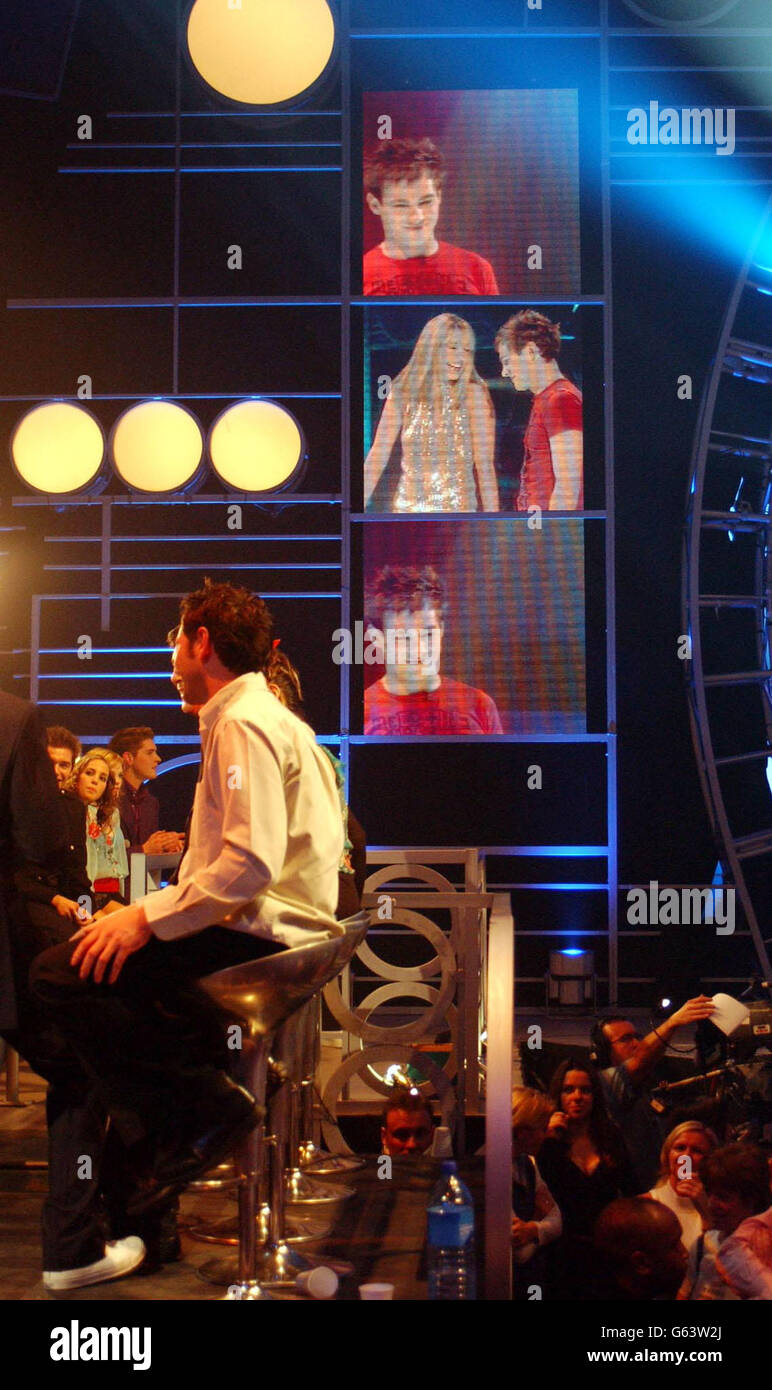 Fame Academy contestant Ainslie Henderson is shown on a video screen at ...