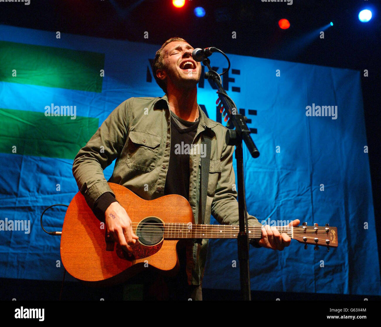 Coldplay's Chris Martin performing on stage during a concert given in ...