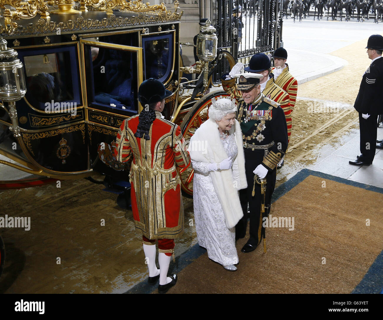 Queen Elizabeth II and The Duke of Edinburgh laugh as they arrive for ...