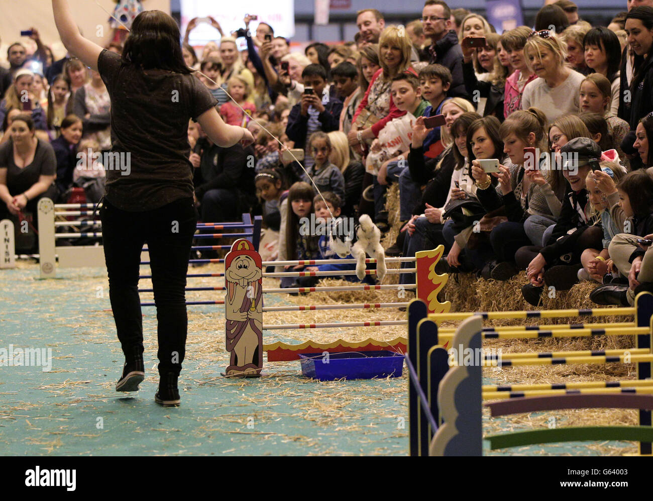 A rabbit show jumping display at the London Pet Show 2013, at Earls ...