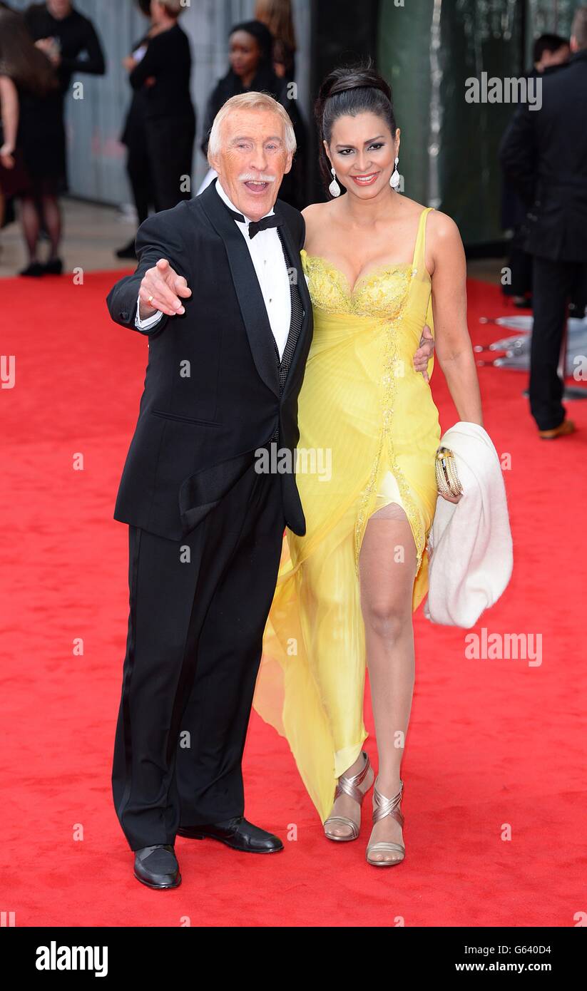 Bruce Forsyth and wife Winnie arriving for the 2013 Arqiva British ...