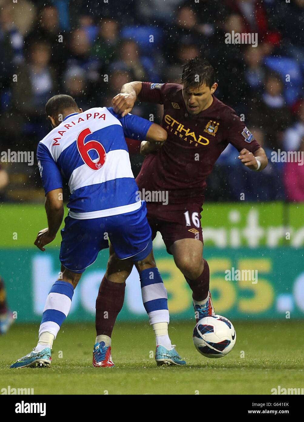 Reading's Adrian Mariappa (left) and Manchester City's Sergio Aguero ...