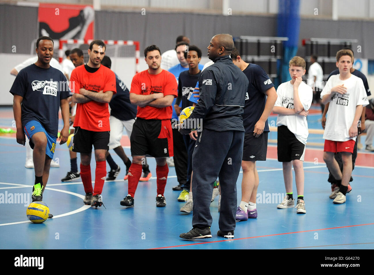 Nathan Blake coaches attendees during the StreetGames Football Pools ...
