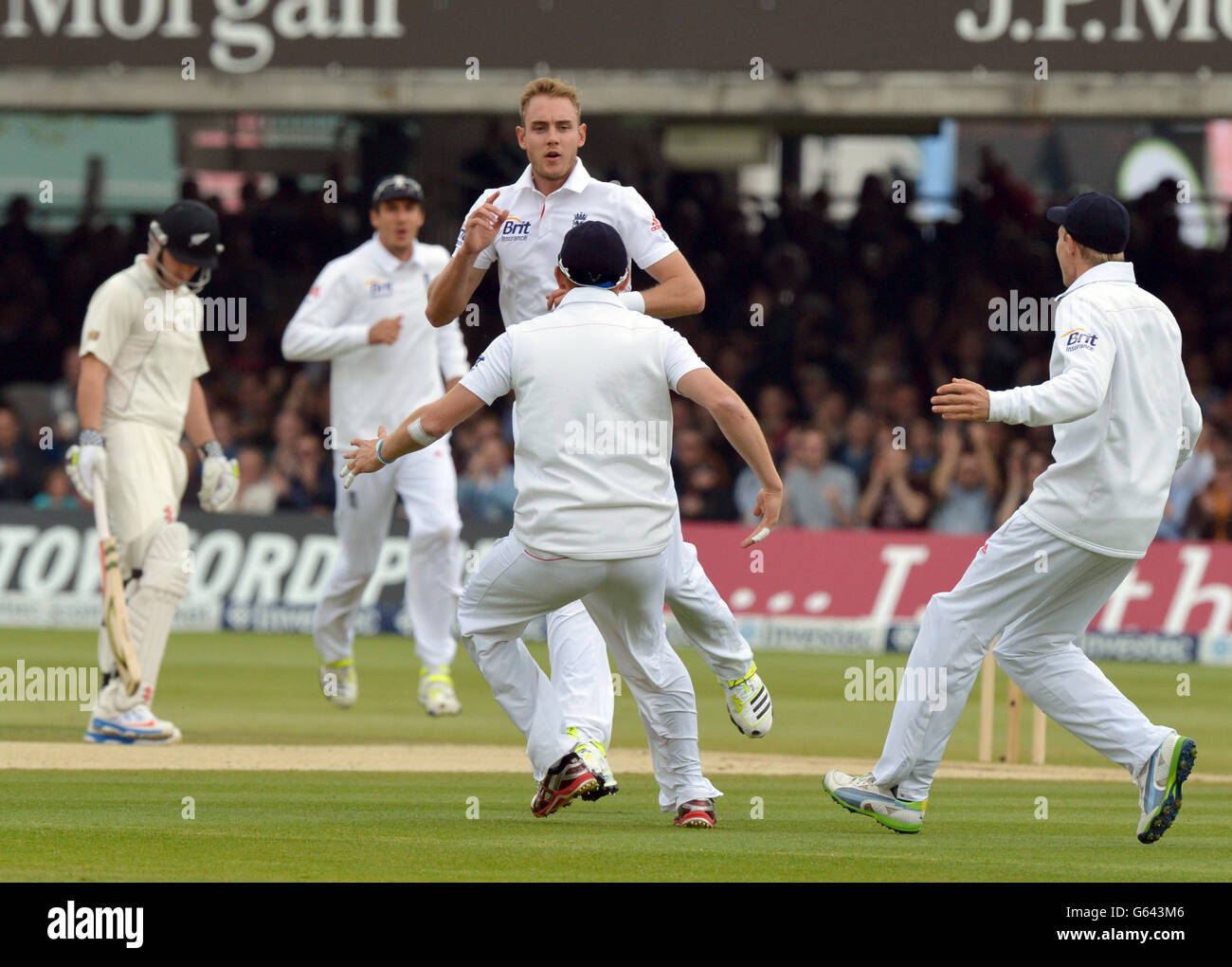 England's Stuart Broad celebrates taking the wicket of New Zealand's ...