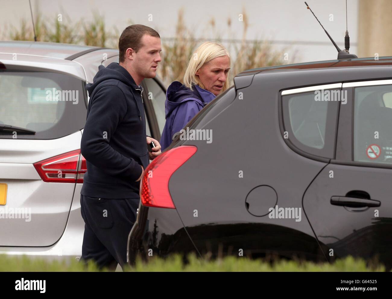 Wayne Rooney's brother Graeme and his mother Jeanette leave Liverpool ...