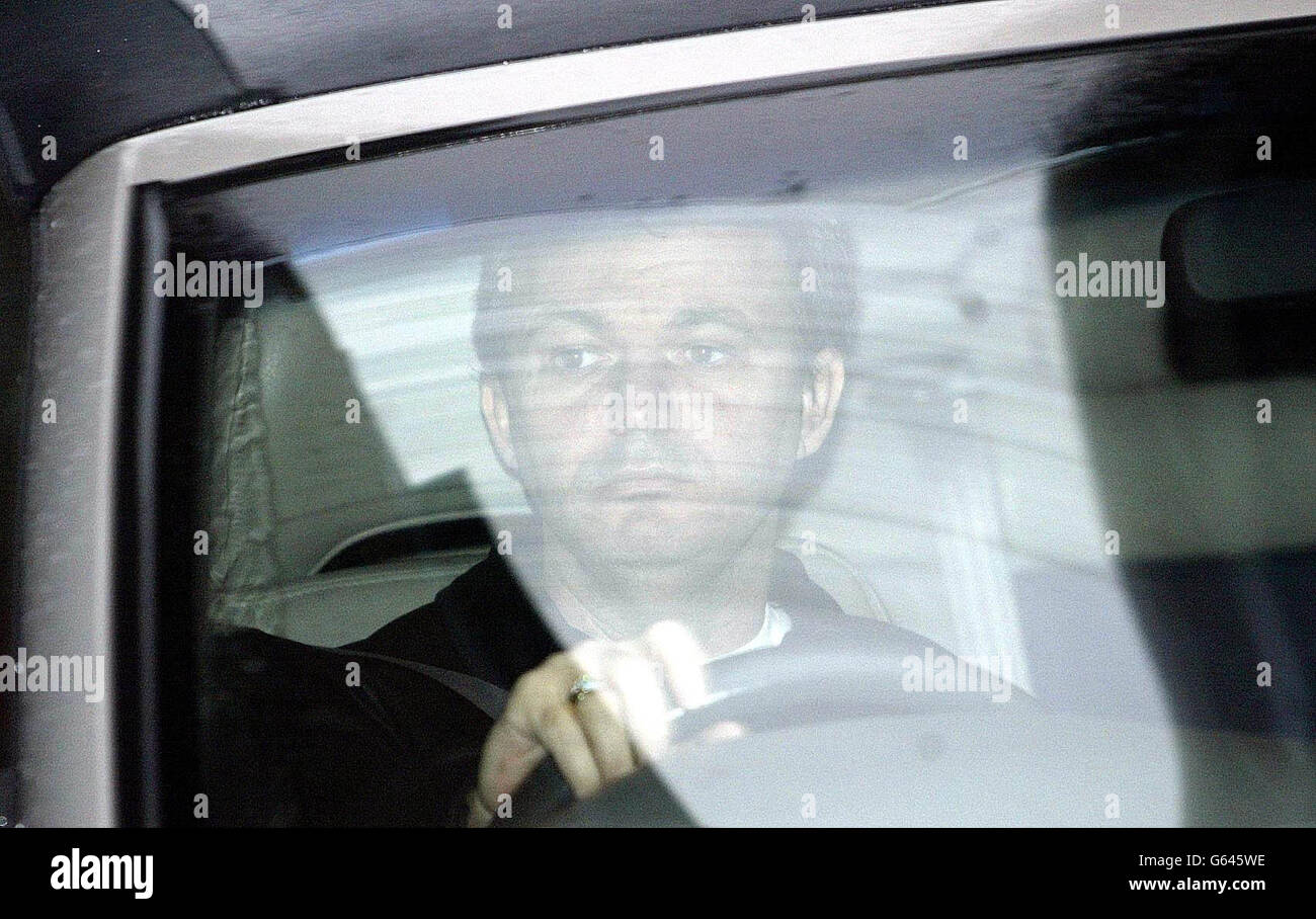 Convicted fraudster Peter Foster leaving the home of his girlfriend ...