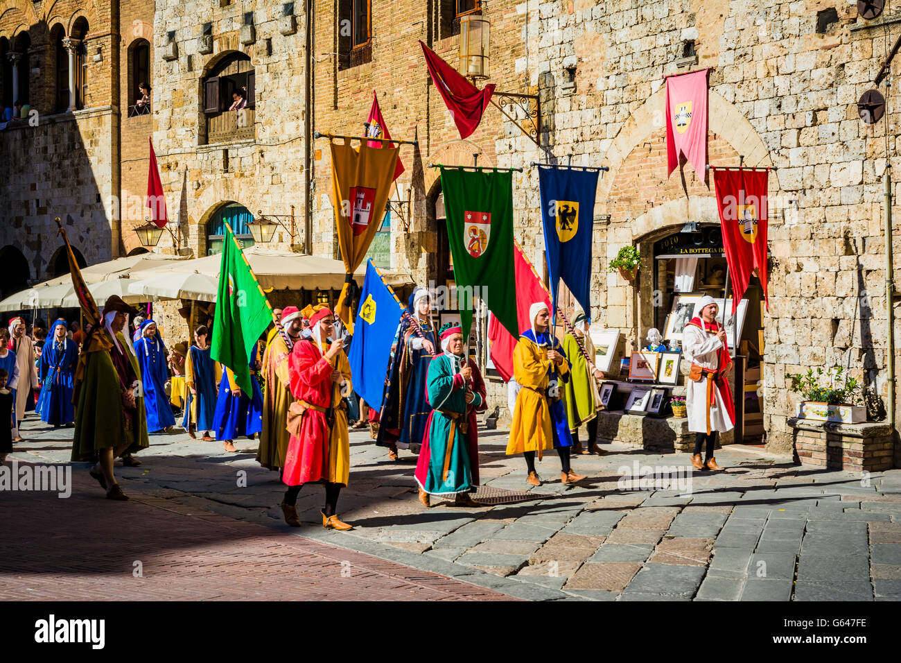 Medieval parade, Italian Renaissance, in the streets of San Gimignano ...