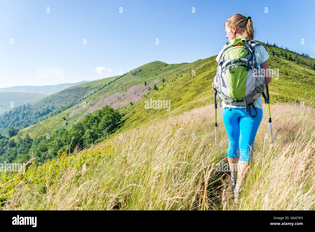 Tourist with backpack Stock Photo - Alamy